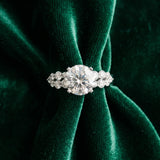 Platinum Round Cluster Diamond Engagement Ring with Pavé Band and Four